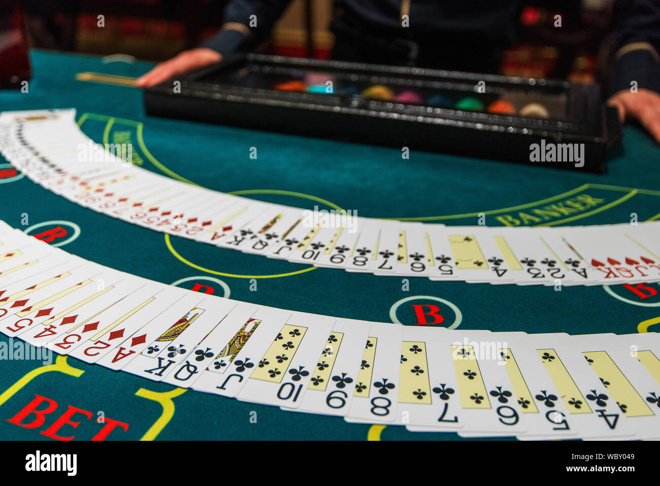 Croupier dealing cards hi-res stock photography and images - Alamy