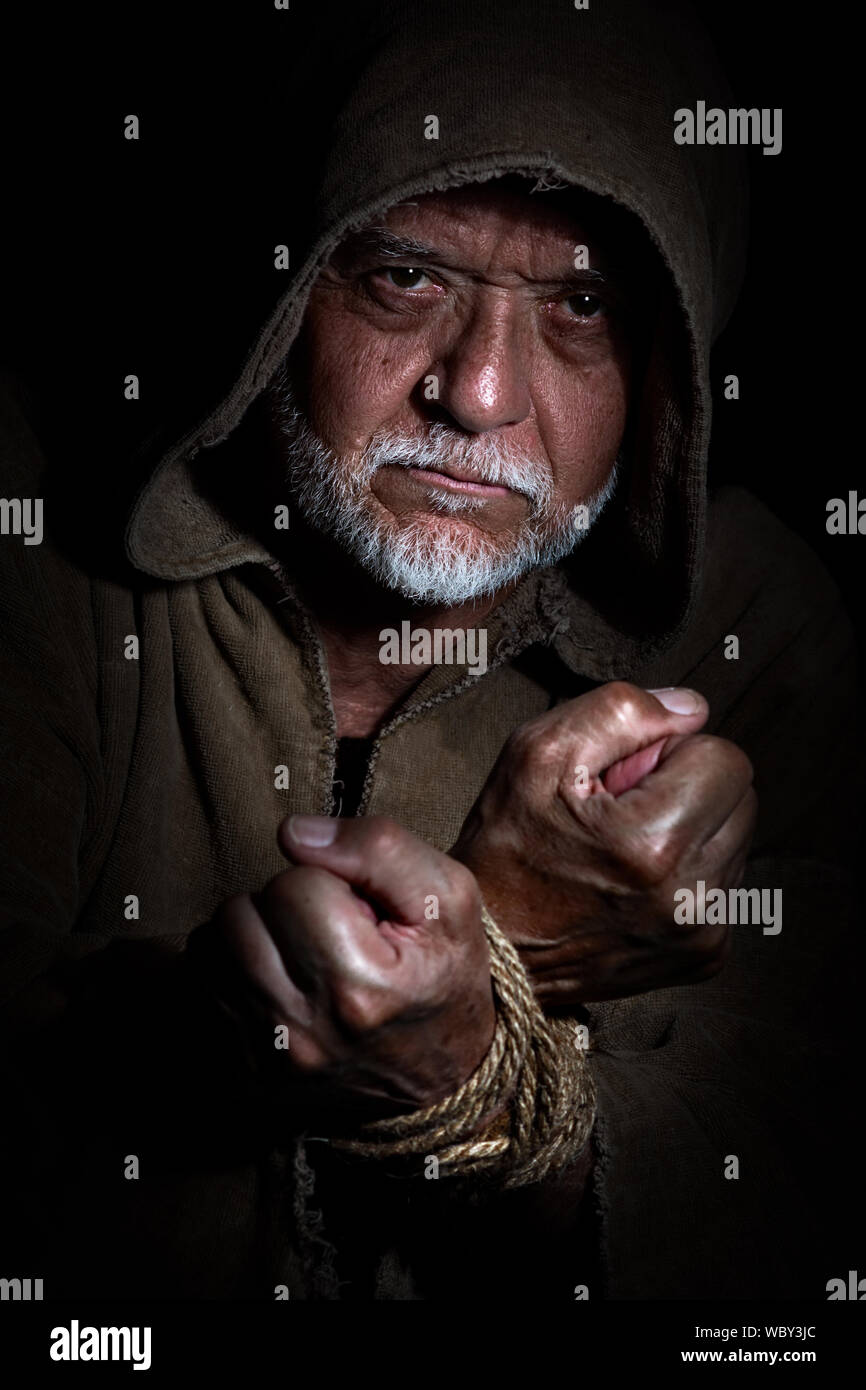 medieval monk bound and imprisoned Stock Photo - Alamy