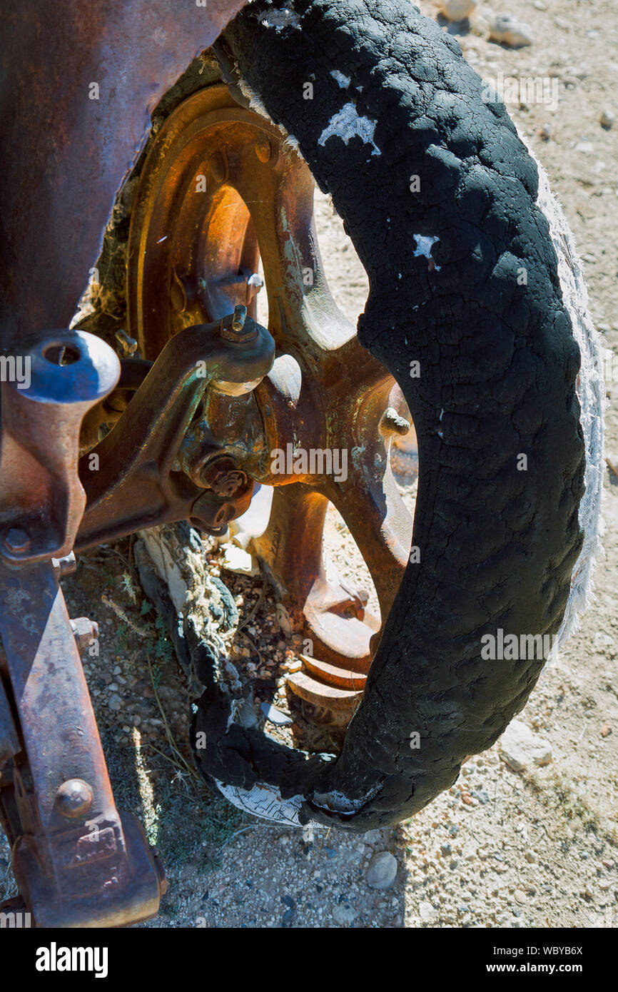 BRYCE, UTAH/USA - NOVEMBER 5 : Threadbare tyre and rusty wheel on an ...