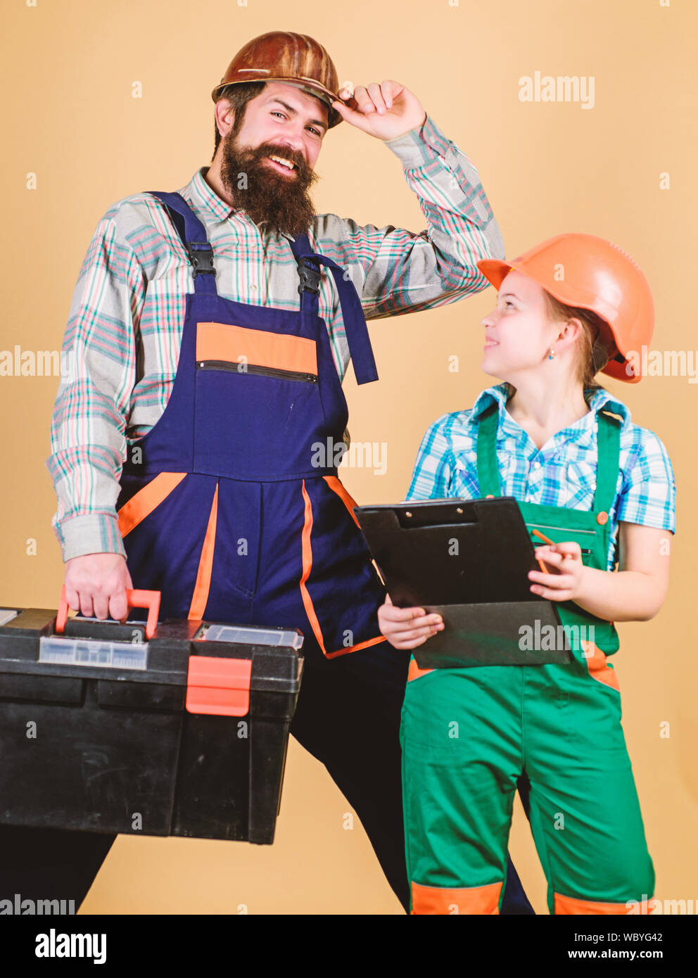 Repair. Children creativity. Bearded man with little girl. construction ...