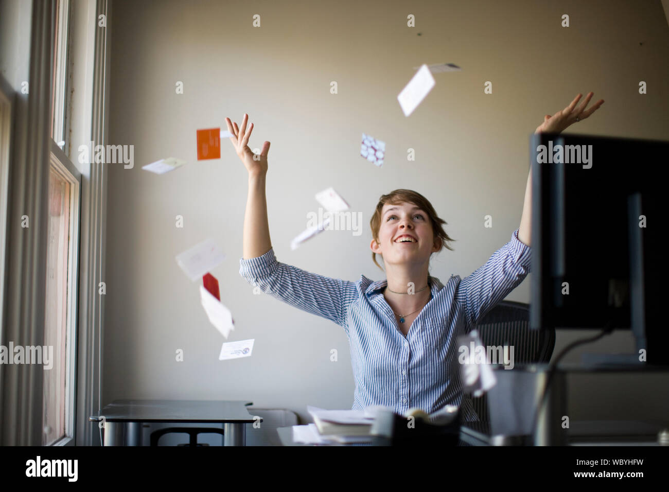 Throwing cards in the air hi-res stock photography and images - Alamy