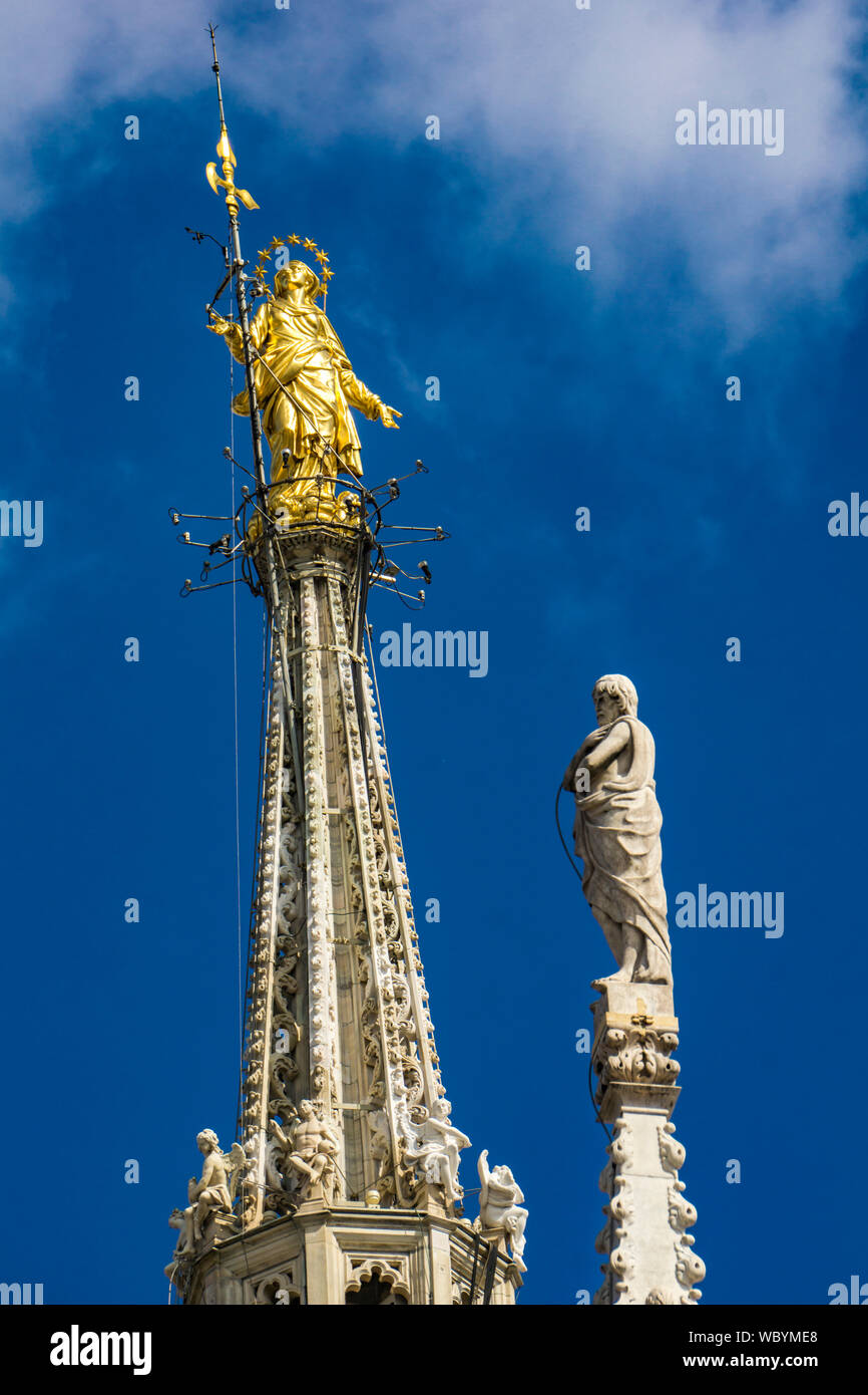 Statue of the Virgin Mary on top of the Milan Cathedral (Duomo di ...
