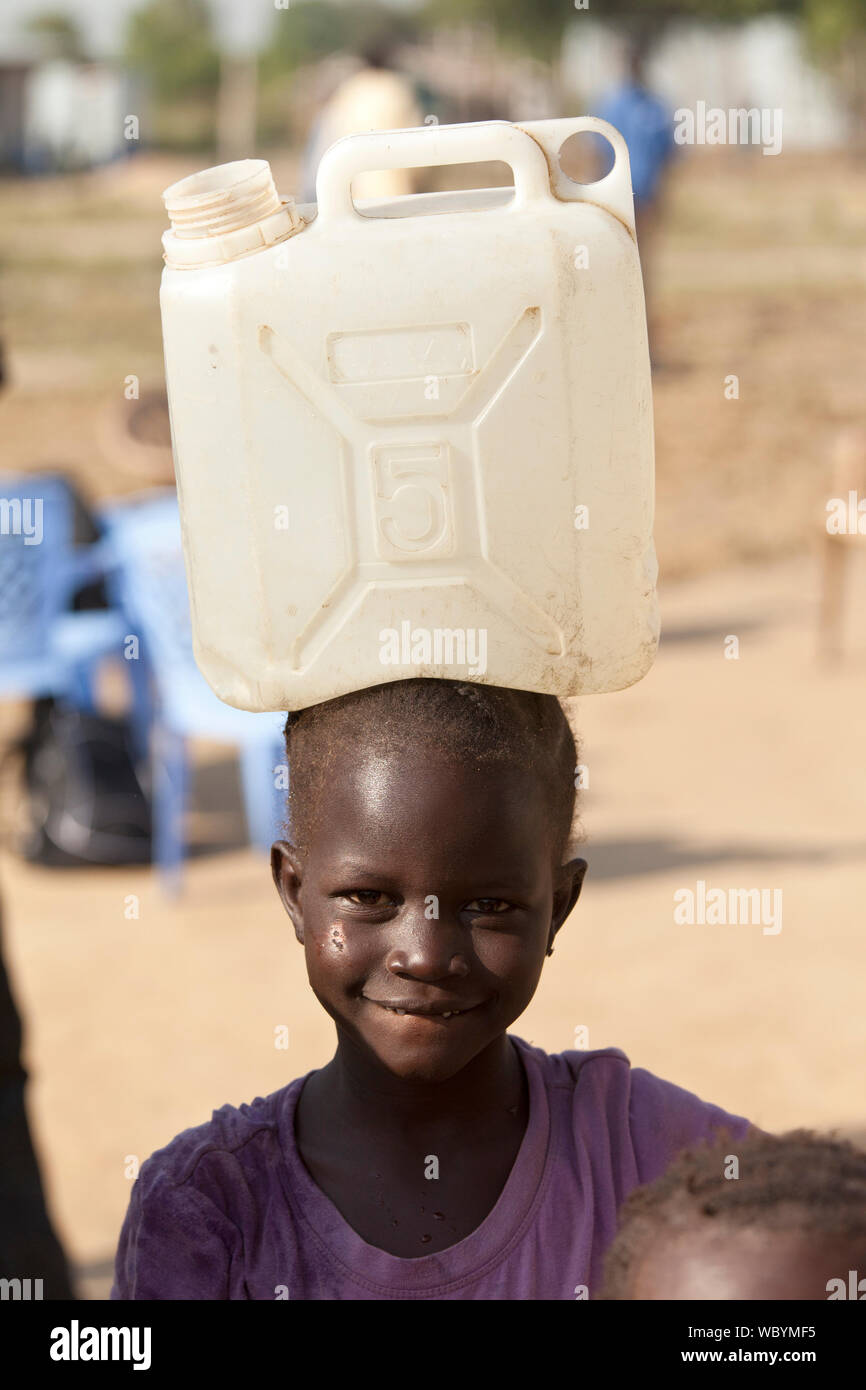 Carry water africa kids hi-res stock photography and images - Alamy