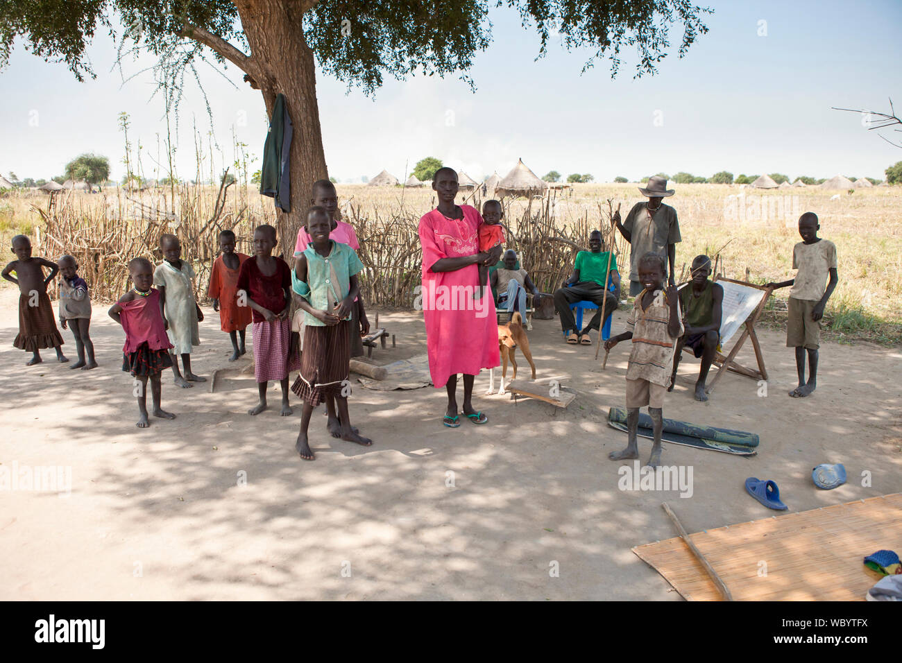 Large african family in village hi-res stock photography and images - Alamy