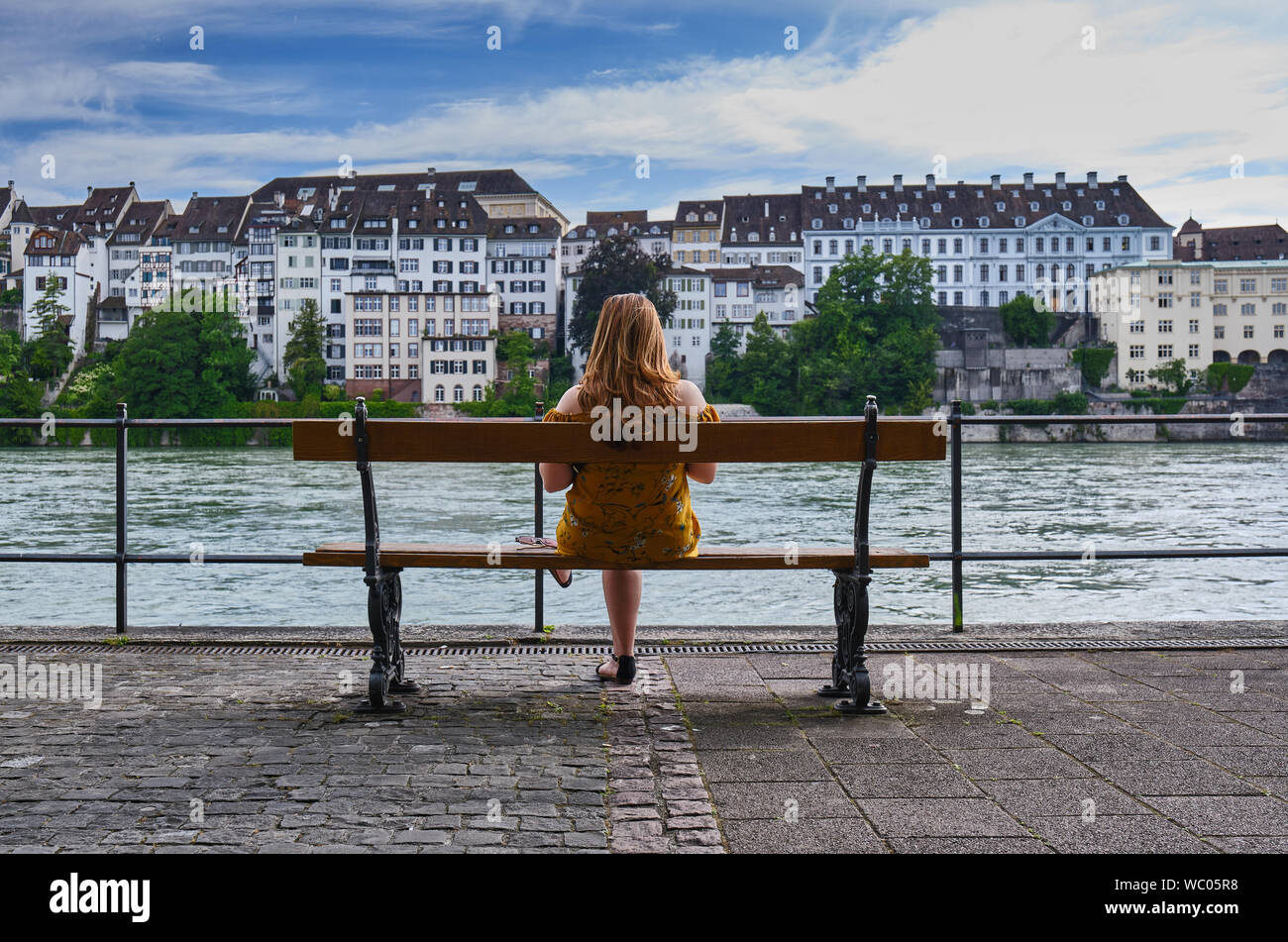Boy sitting bench rear view hi-res stock photography and images - Alamy