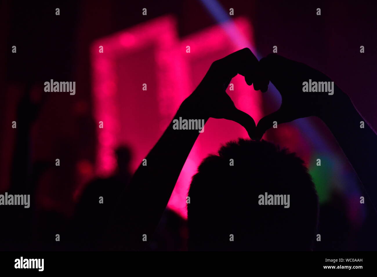 Concert hands heart hi-res stock photography and images - Alamy