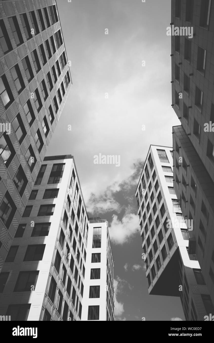 High-rise buildings of modern city. View from below Stock Photo - Alamy