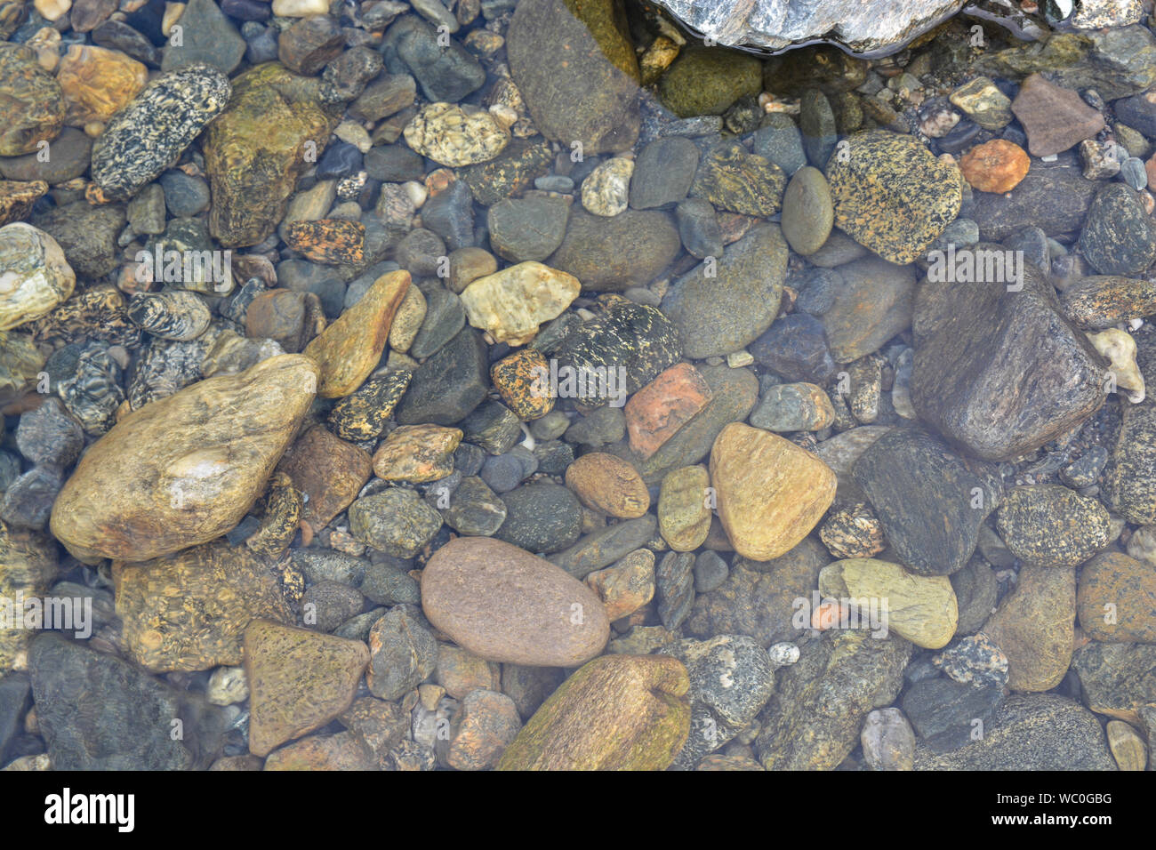 Shiny pebbles hi-res stock photography and images - Alamy