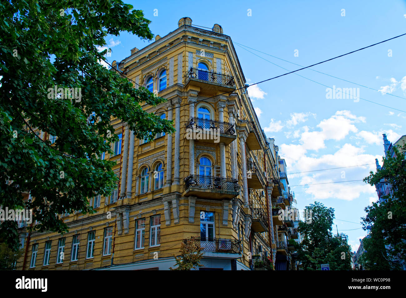 Angle of antique building with balcony. Architecture large building of ...