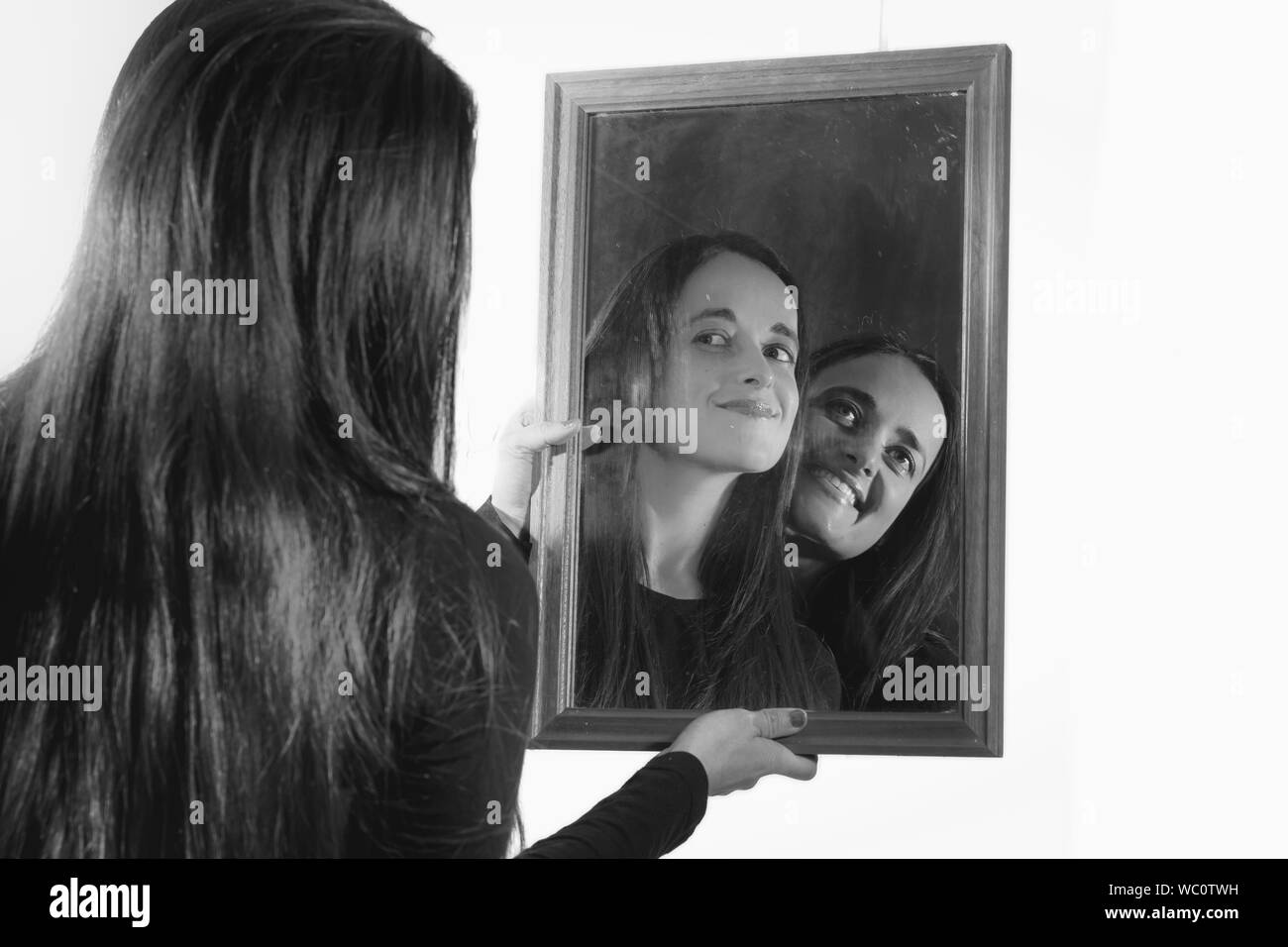 Woman rear view mirror Black and White Stock Photos & Images - Alamy