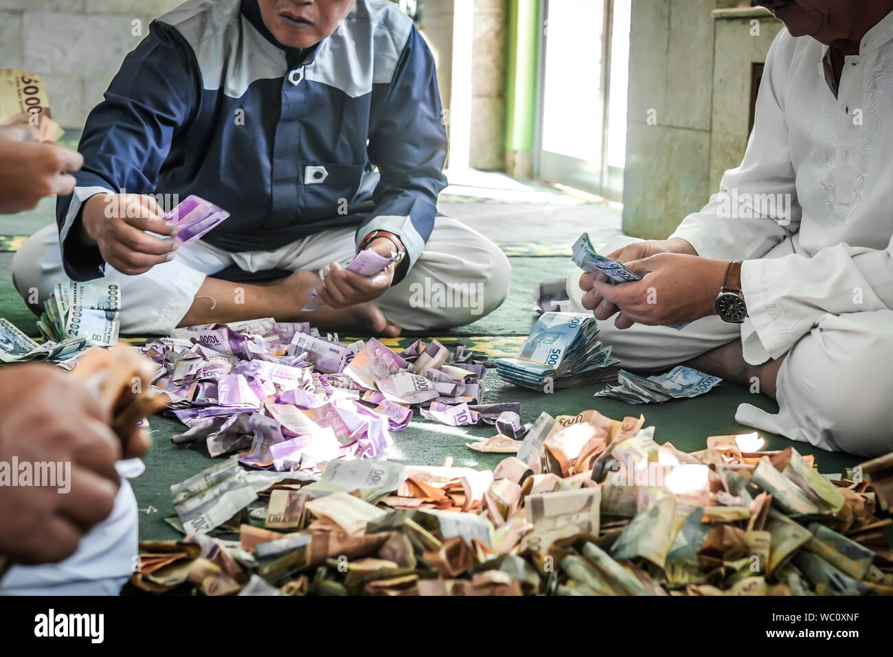 Money charity box hi-res stock photography and images - Alamy
