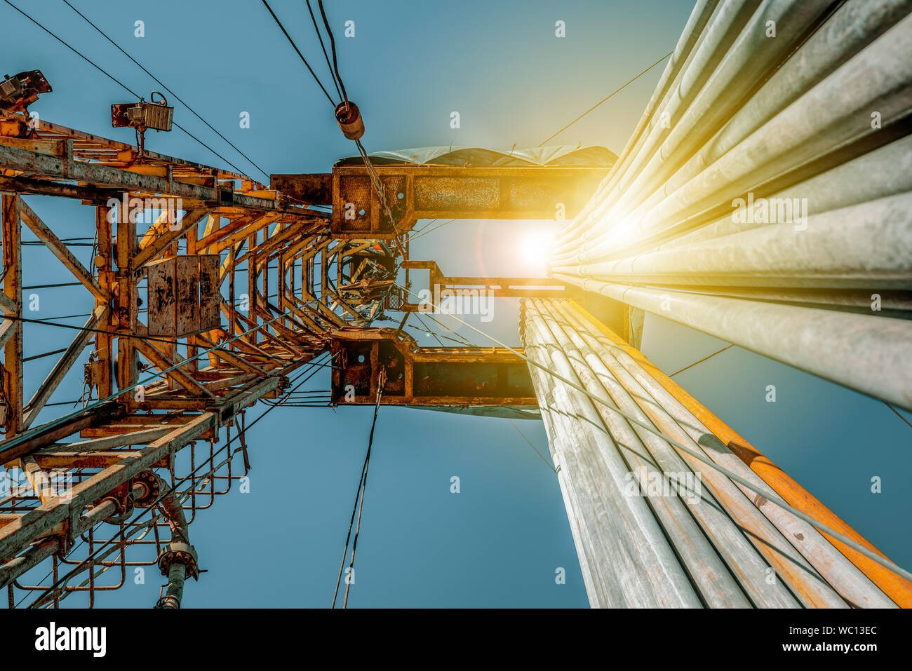 Onshore land rig in oil and gas industry. Oil drilling rig against a ...