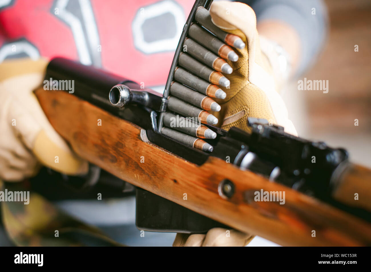 Holding ammunition hi-res stock photography and images - Alamy