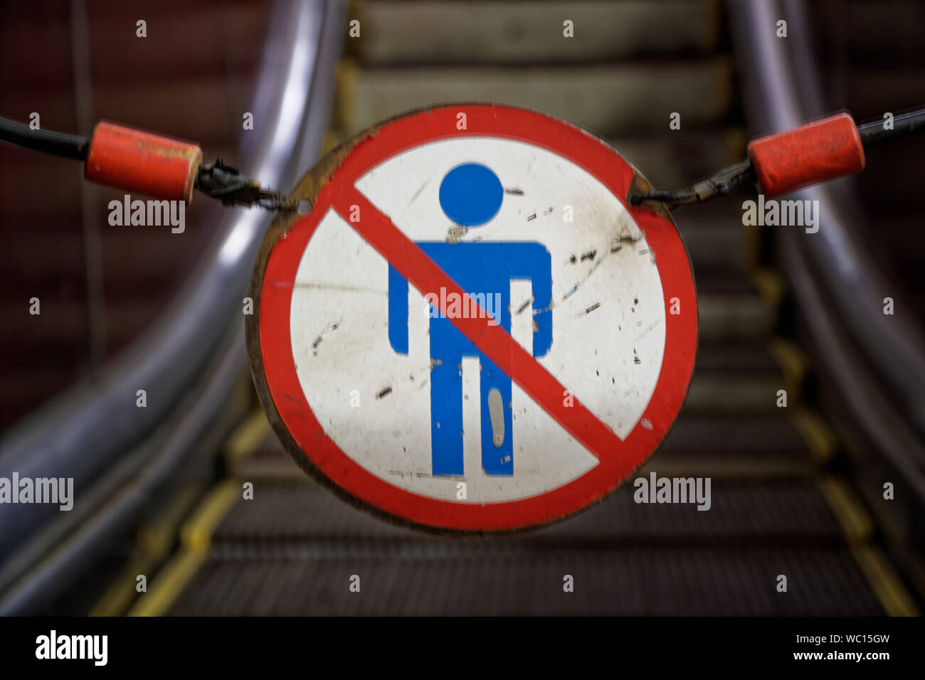 Do not enter - no trespassing sign on chains at railway station, soft ...
