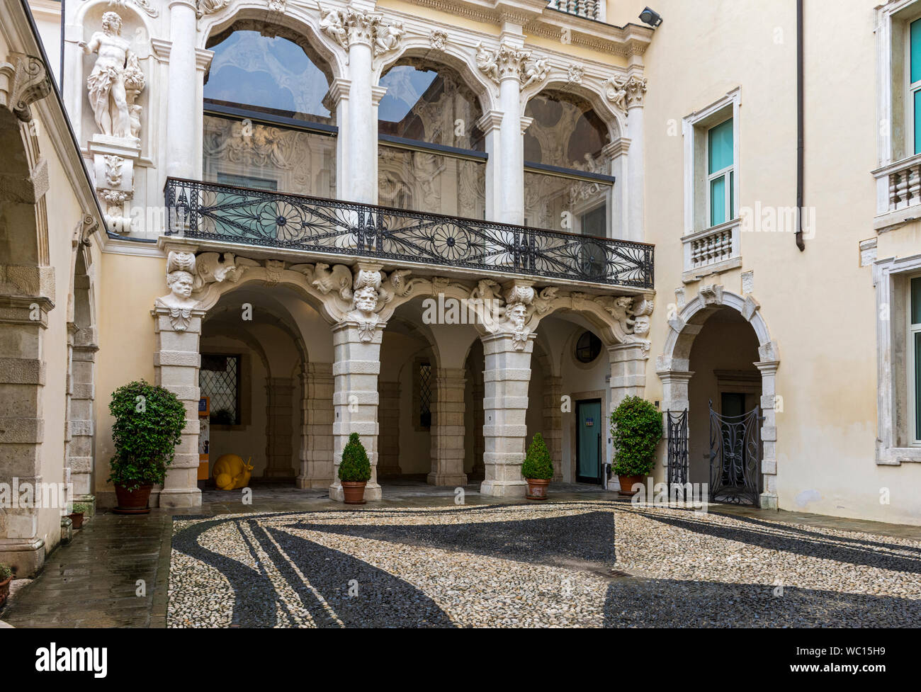 The pebbled courtyard of the Palazzo Leoni Montanari which houses the ...