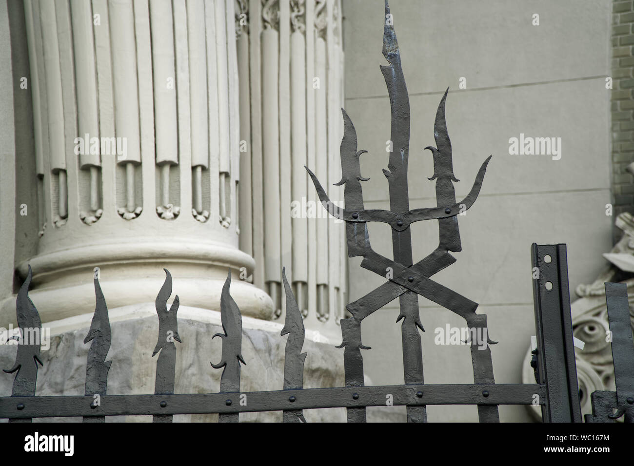 Weathered metal post finials Trident metal fence for protection against ...