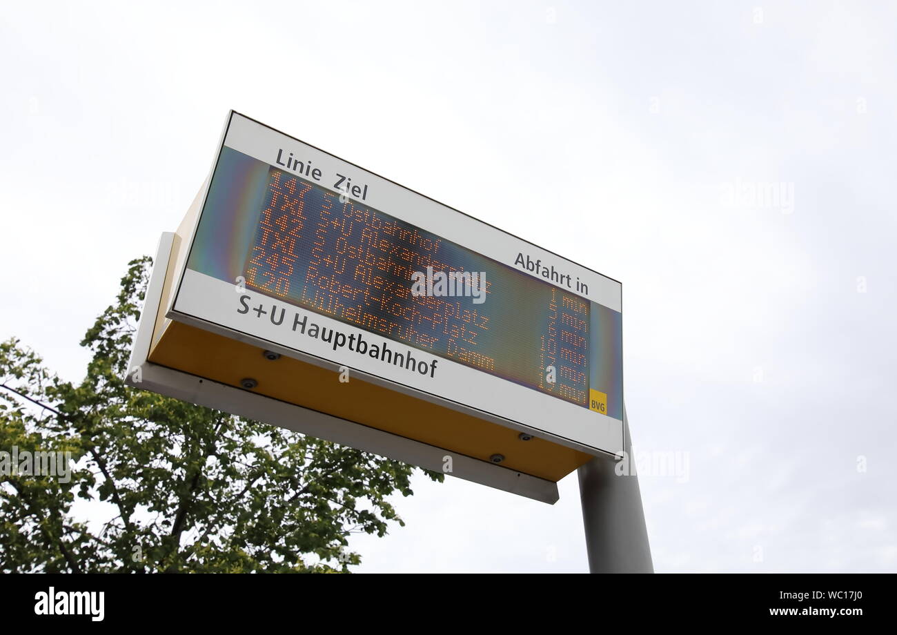 Bus stop displays arrival information in Berlin Germany Stock Photo - Alamy