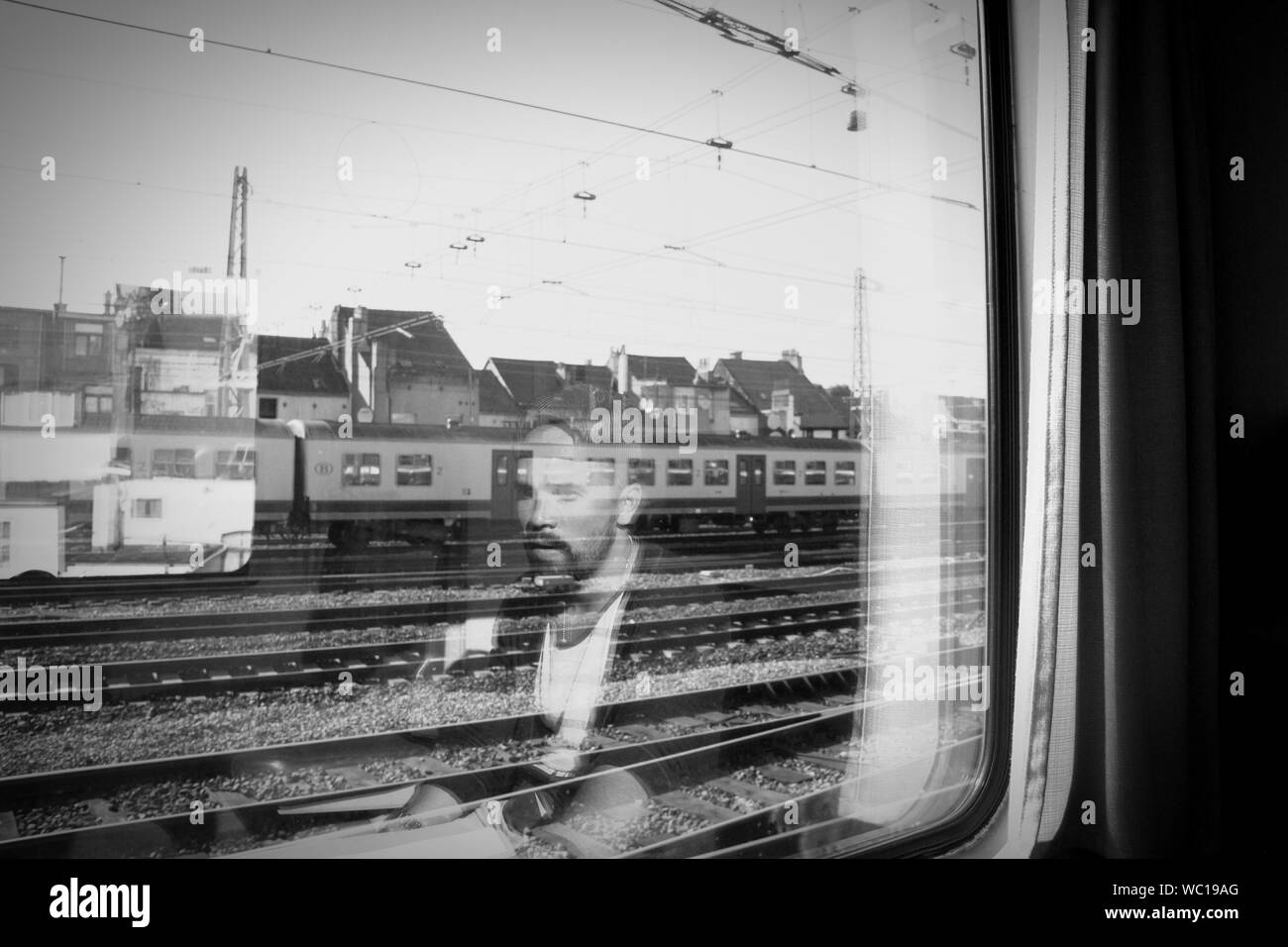 Person train window Black and White Stock Photos & Images - Alamy
