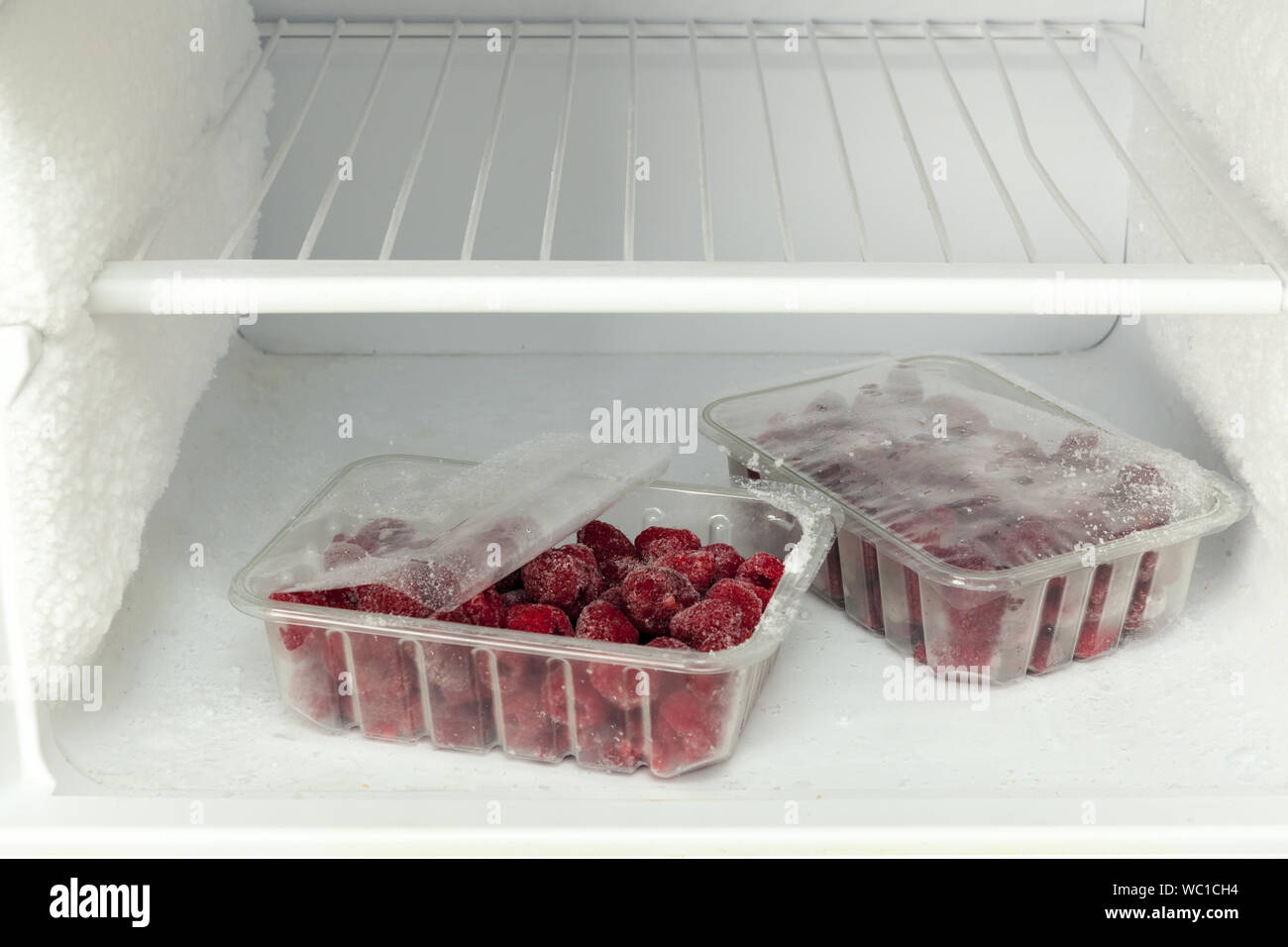 frozen raspberries in the freezer, packaging in plastic ambalage Stock ...