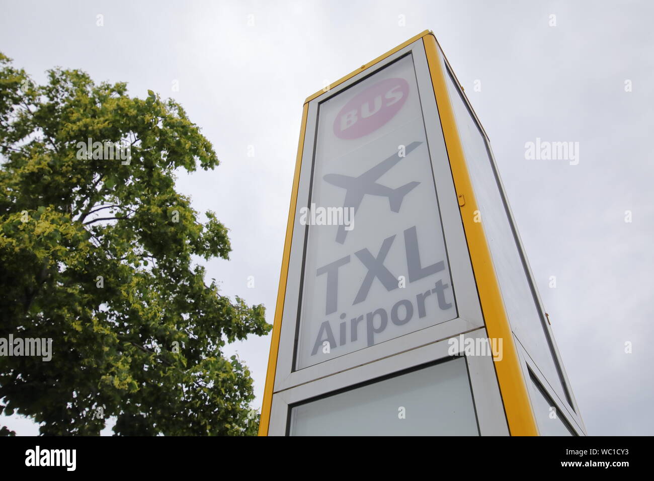Airport shuttle bus sign Berlin Germany Stock Photo - Alamy