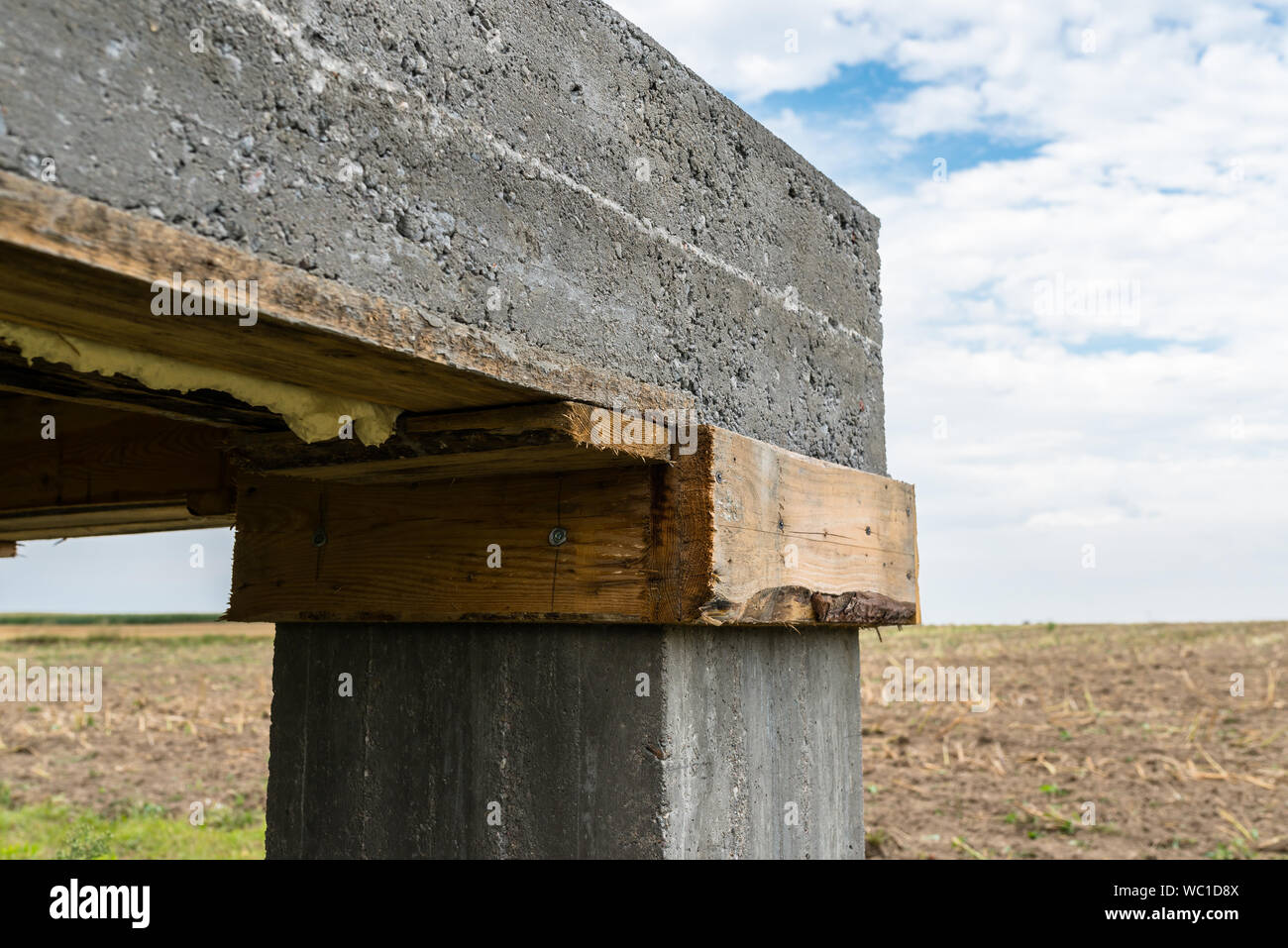 Reinforced concrete slab in the shape of a rectangle on concrete poles ...