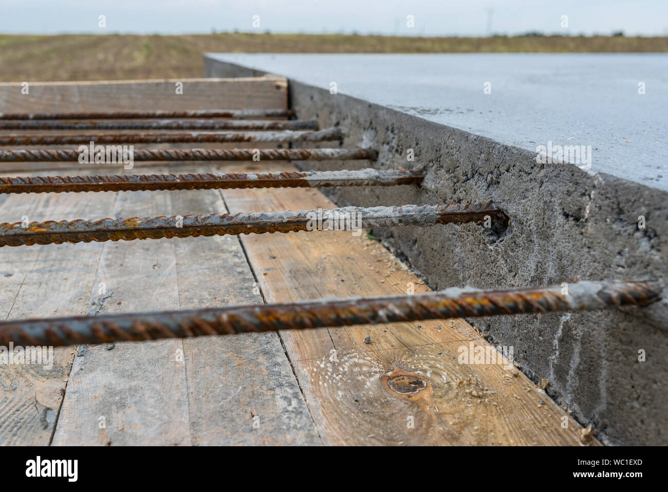 Reinforcing bars sticking out of reinforced concrete slab Stock Photo ... Reinforcing bars sticking out of reinforced concrete slab Stock Photo ...