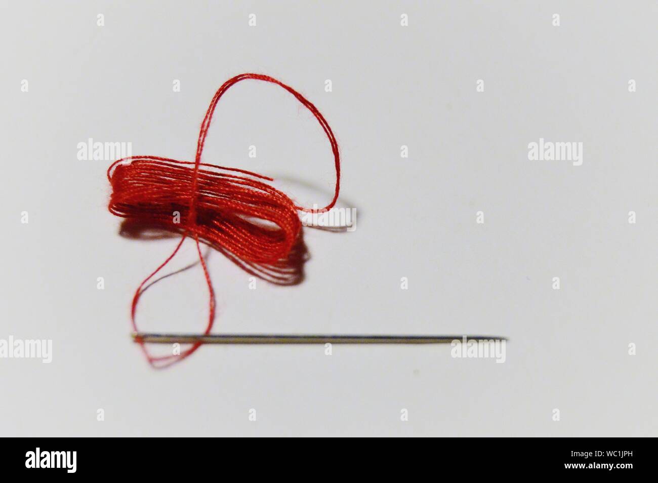 Needle red hi-res stock photography and images - Alamy