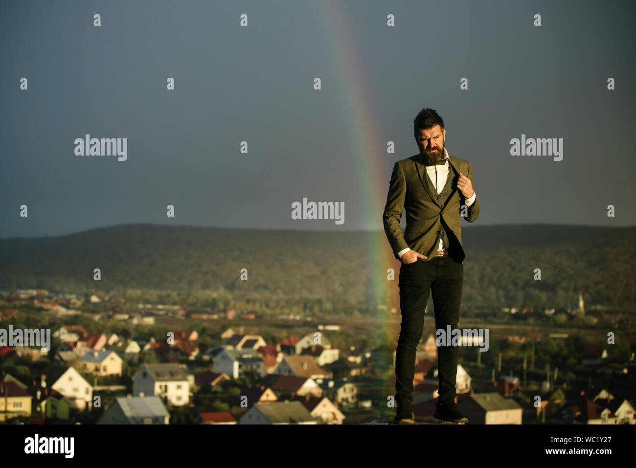 Guy with strict face in suit feels free and successful Stock Photo - Alamy