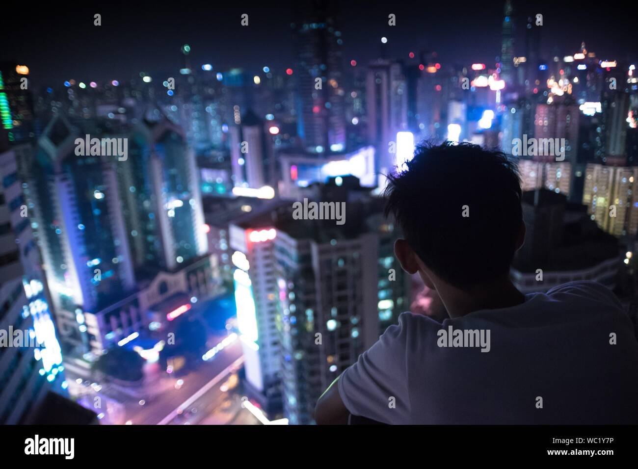 Man above city hi-res stock photography and images - Alamy