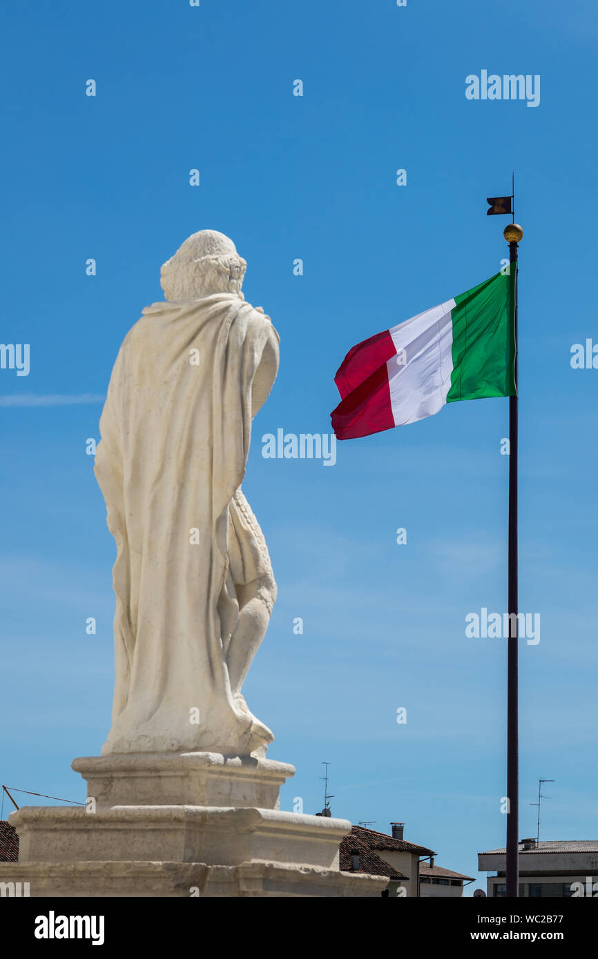 Statue at Piazza Grande in Palmanova, Italy, Italian flag in the ...