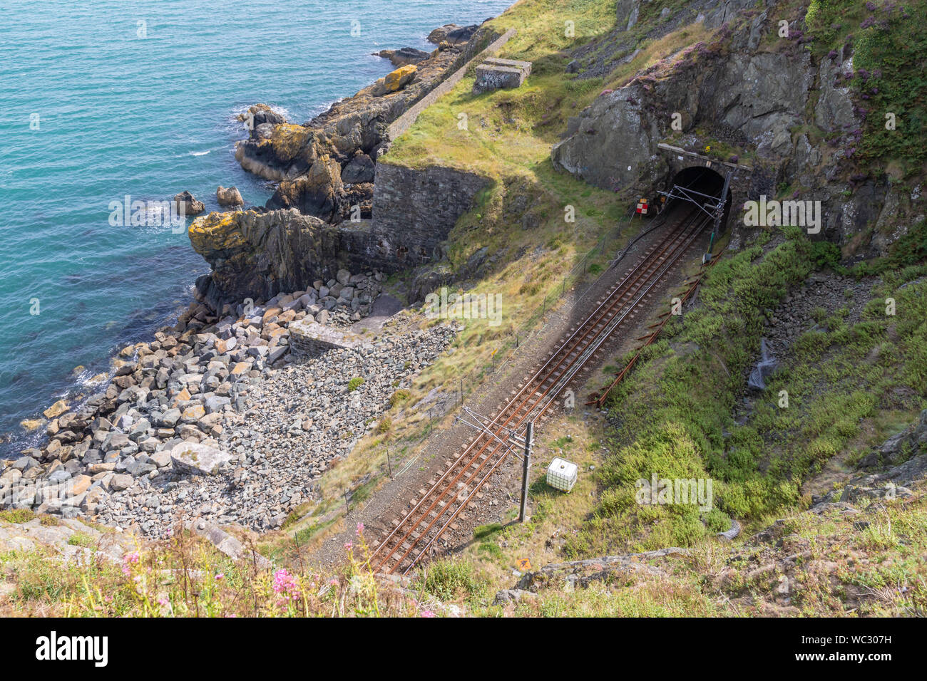 Train rails in Cliff walk trail in Bray, Wicklow, Ireland Stock Photo ...