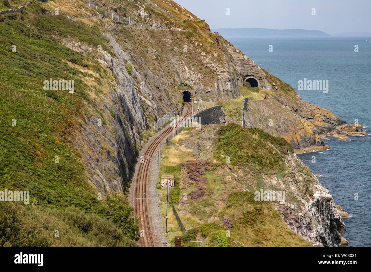 Train rail in Cliff walk trail in Bray, Wicklow, Ireland Stock Photo ...