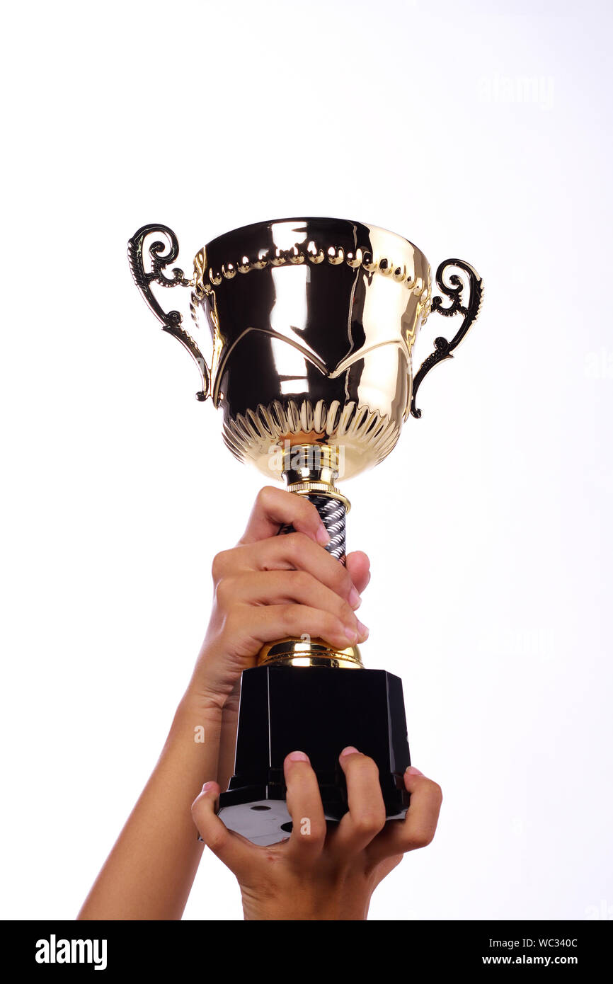 Hands and holding trophy hi-res stock photography and images - Alamy