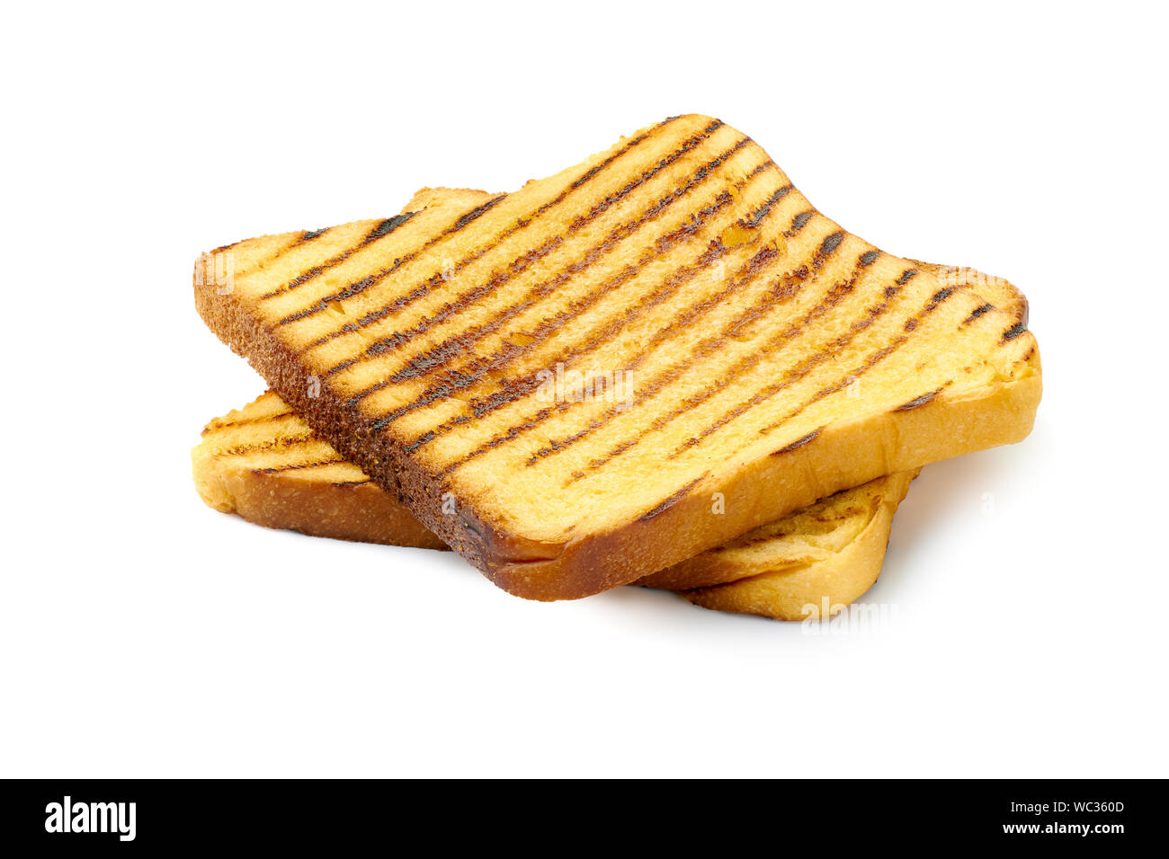 Two slices of roasted toast bread on white Stock Photo - Alamy