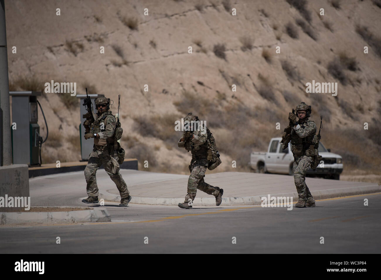 Cypriot Special Forces sprint across a street during urban operations ...
