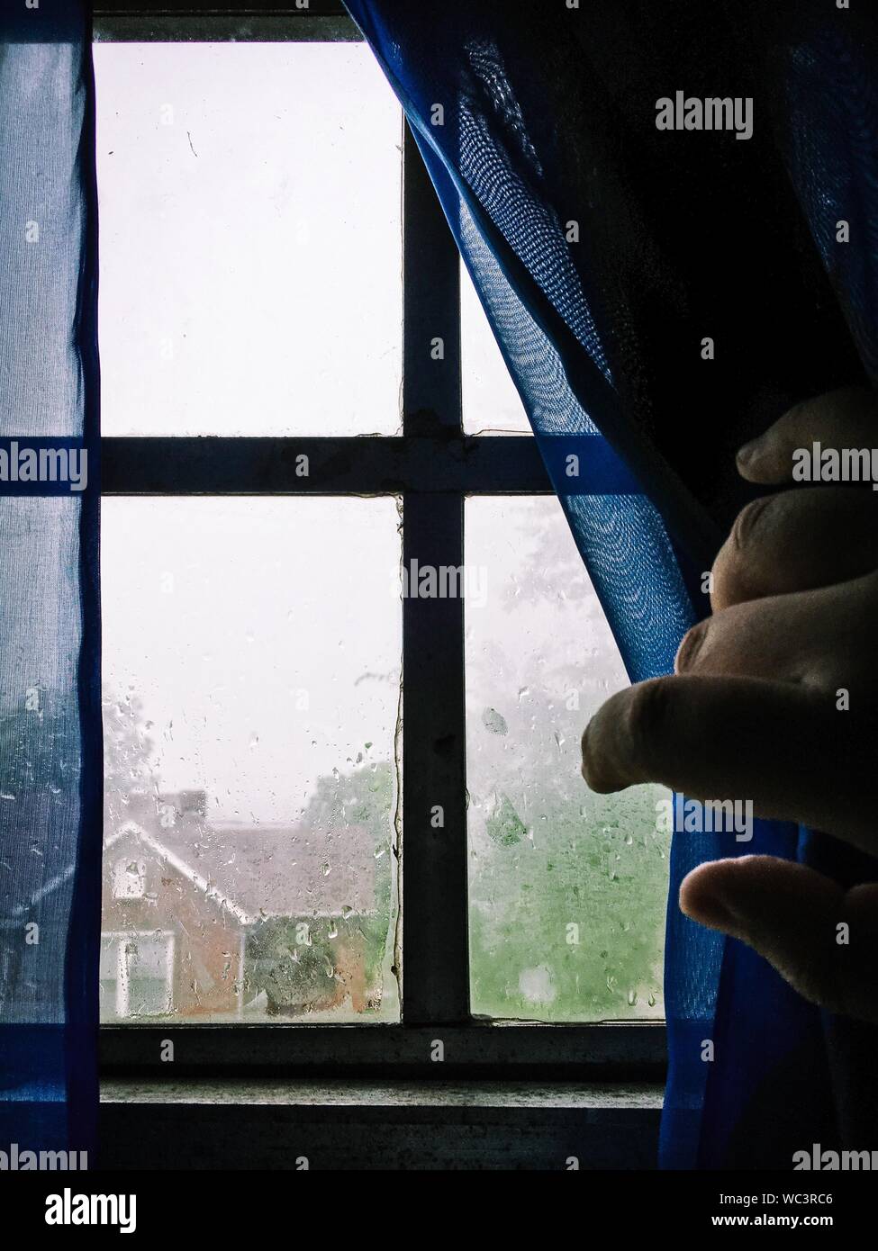 Rainy window hand hi-res stock photography and images - Alamy