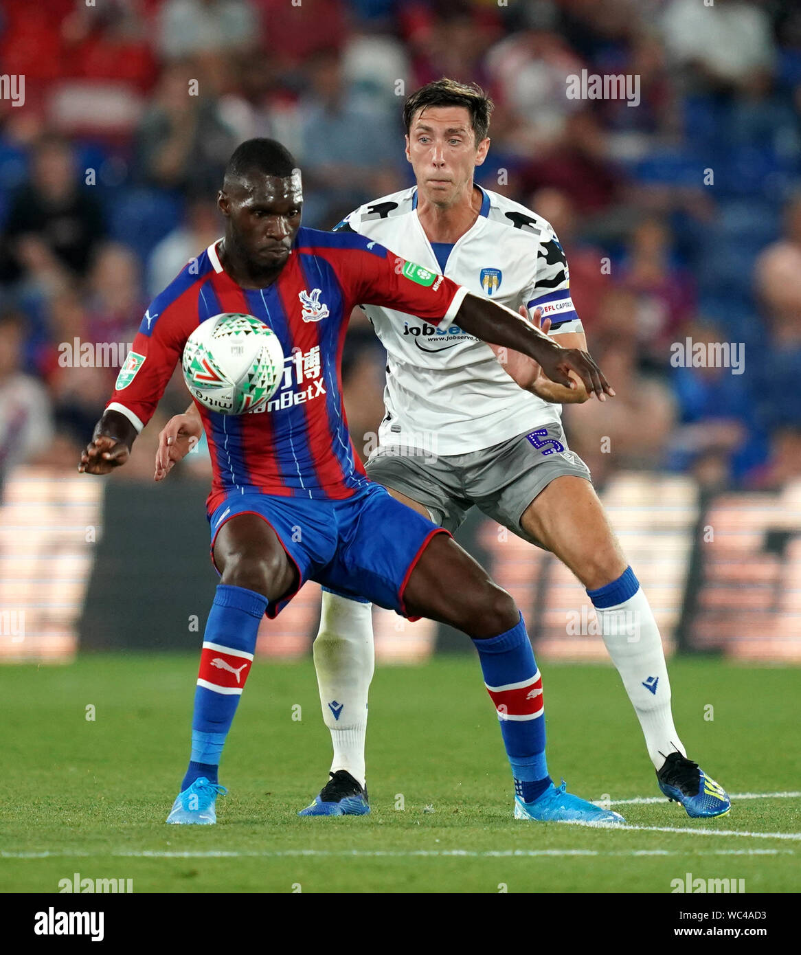 Crystal Palace's Christian Benteke and Colchester United's Luke Prosser ...
