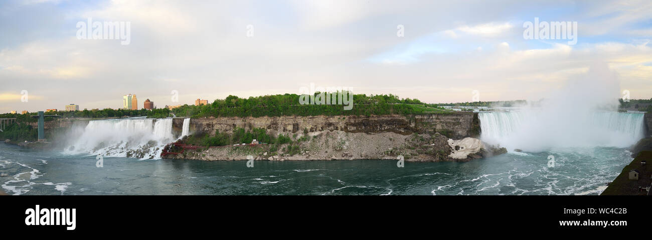 Panoramic view of Niagara Falls viewed from the Canadian side at dusk ...