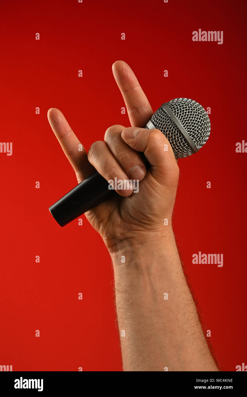 Holding mic up hi-res stock photography and images - Alamy