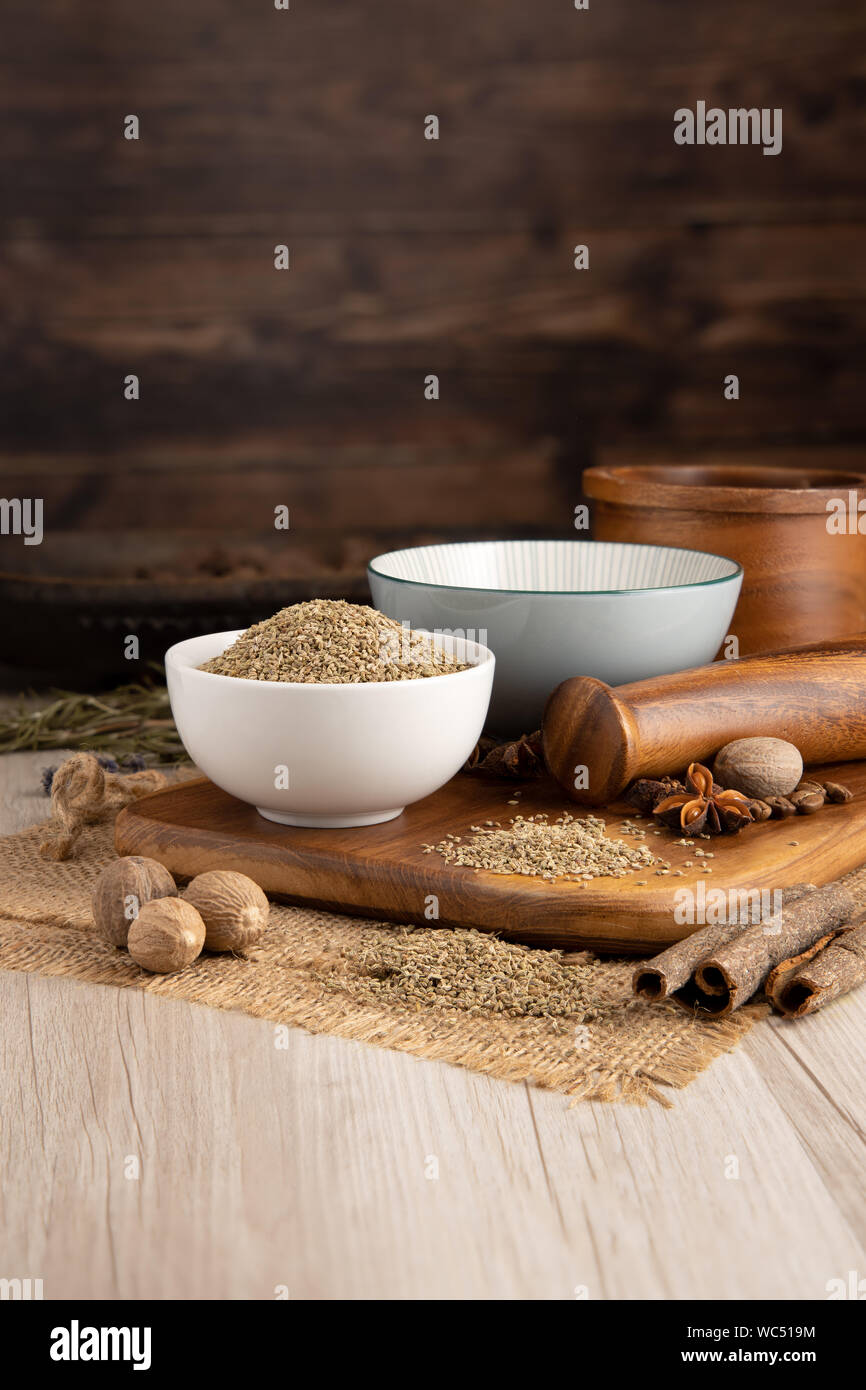 Ajwan Carom seeds in a bowl and food preparation and kitchen setting ...