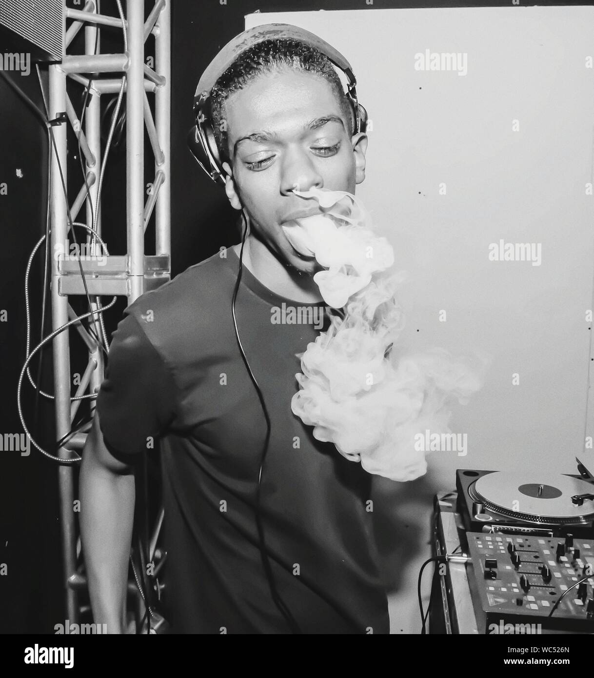 Man exhaling smoke hi-res stock photography and images - Alamy