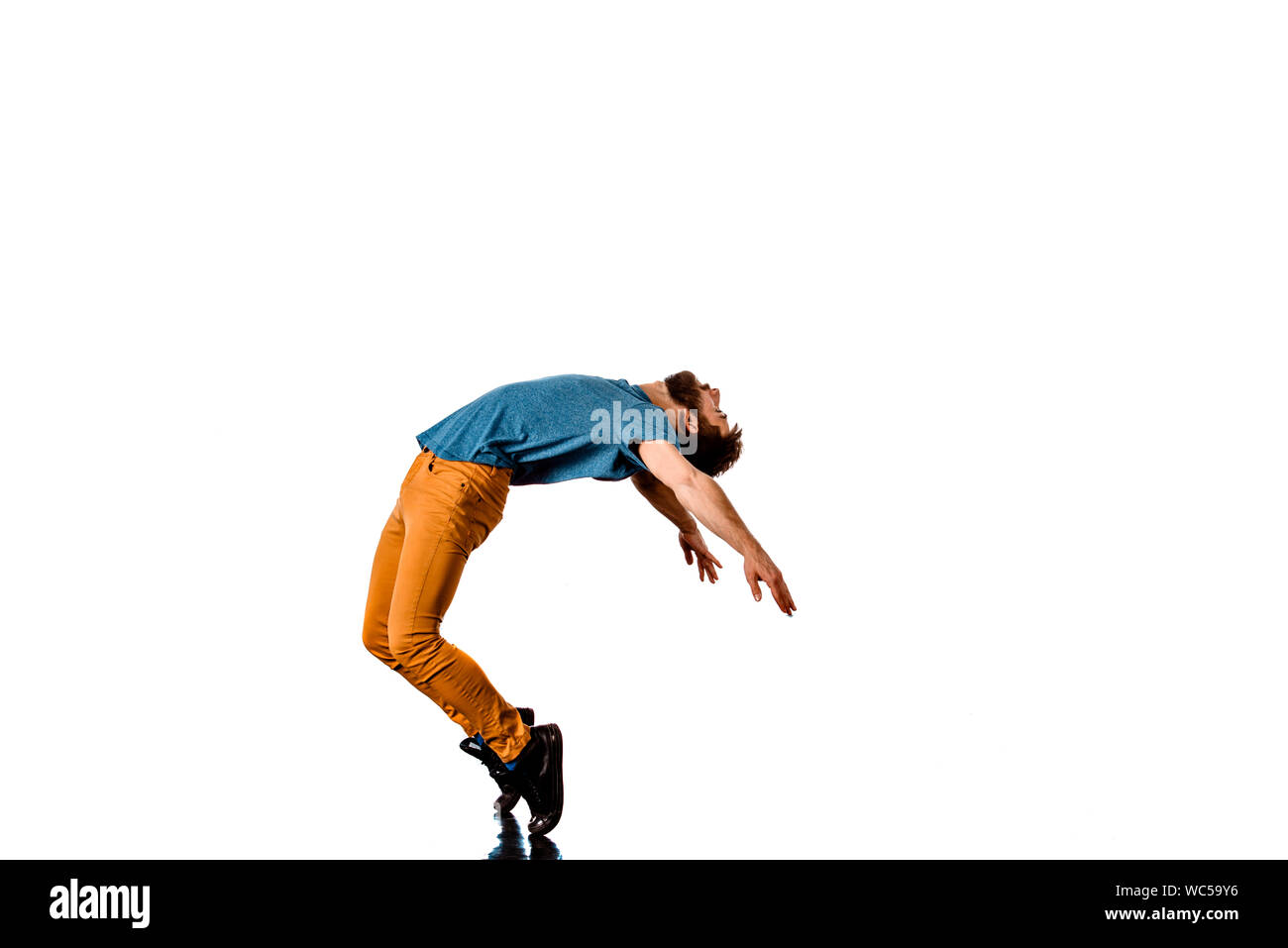 Amazing dancer is doing breakdance on a white background Stock Photo ...