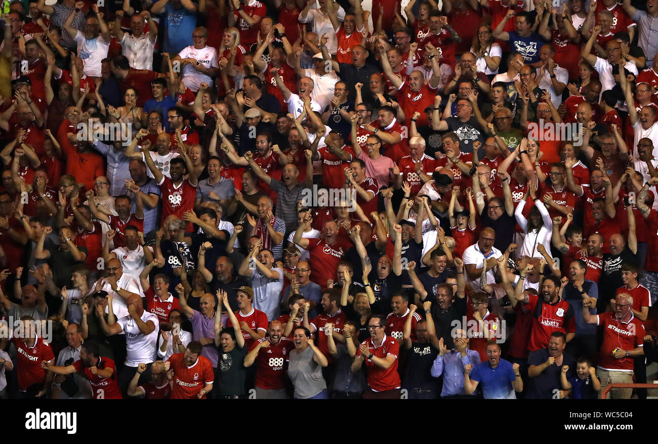Nottingham Forest fans celebrate their side's third goal of the game ...