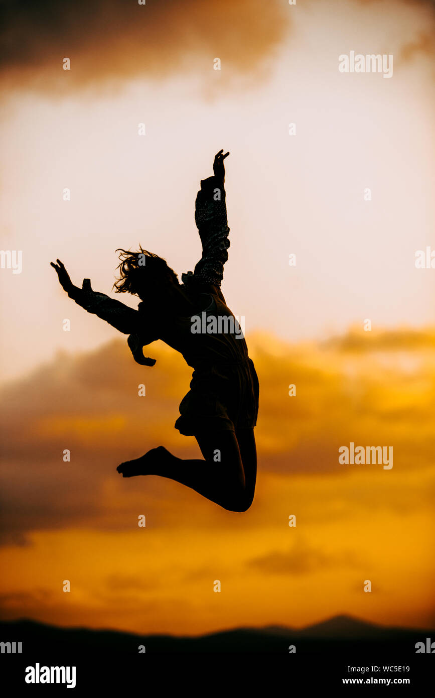 Passionate young woman dancer in a beautiful dreamy pose Stock Photo ...