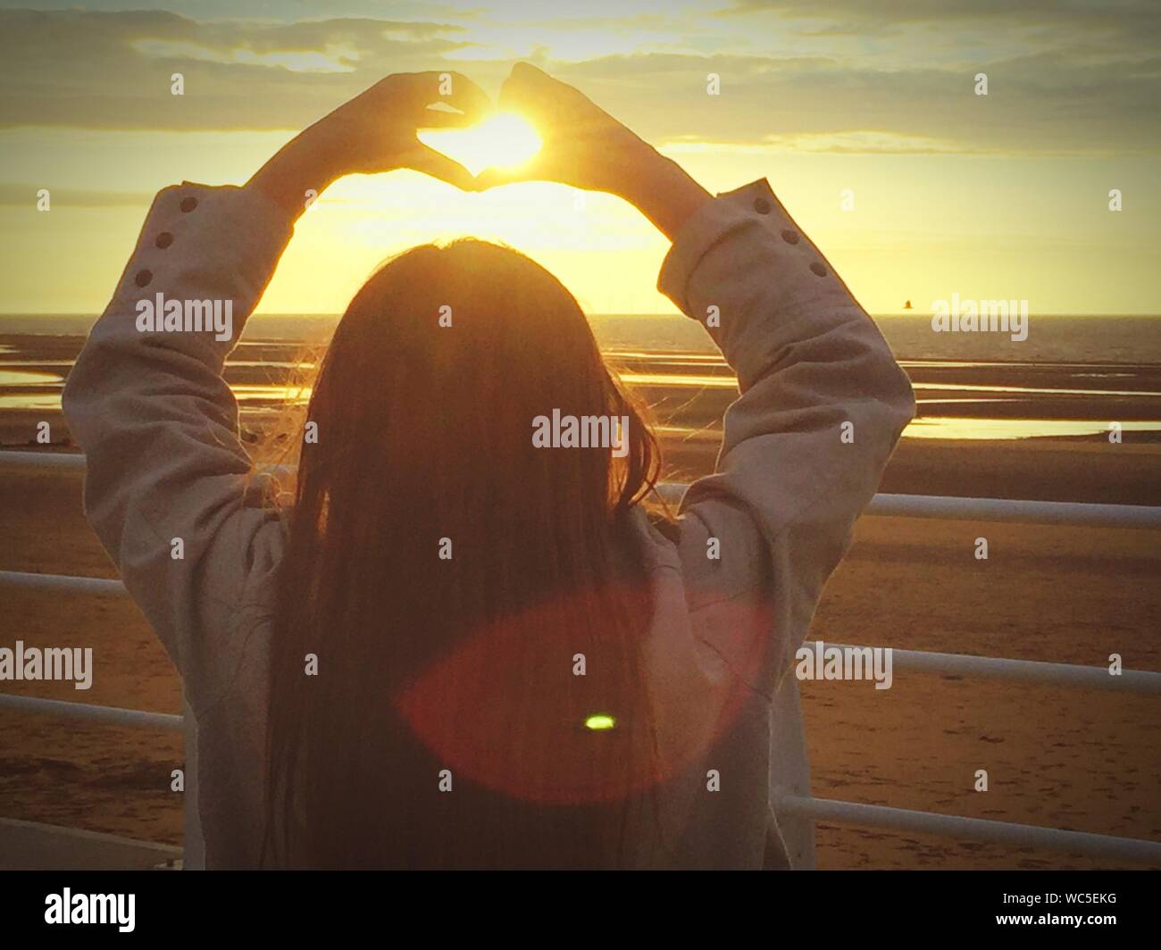 Heart Shape Hands Sun High Resolution Stock Photography and Images - Alamy