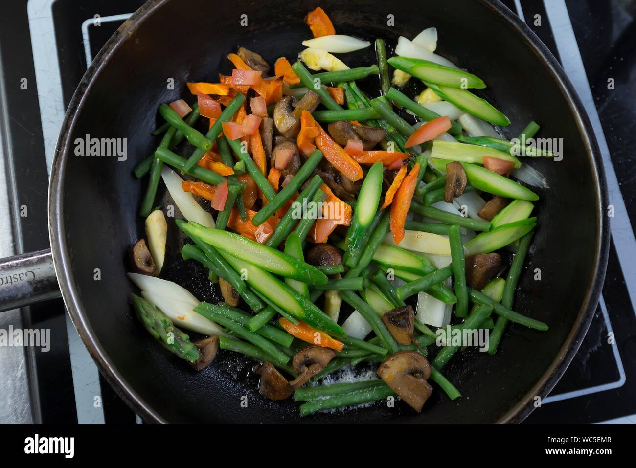 Fresh vegetables in a pan on an induction stove, Baden-Wurttemberg ...