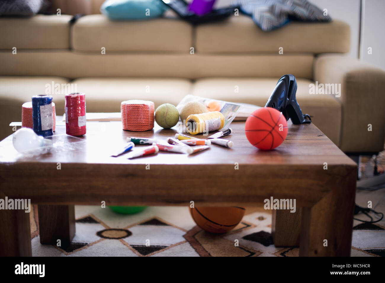 Table full of toys and science stuff for education of a child Stock ...