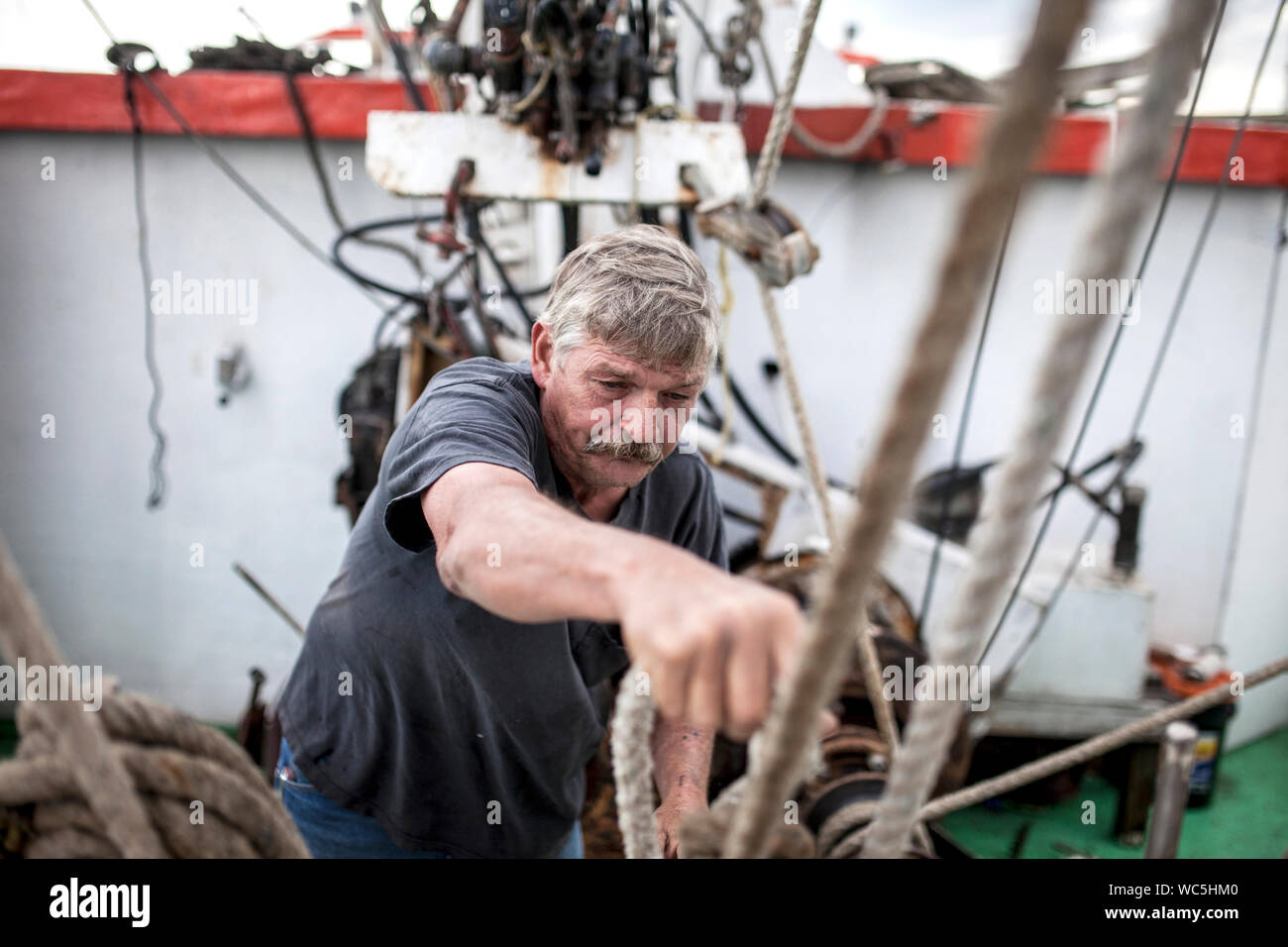 Deckhand at work hi-res stock photography and images - Alamy