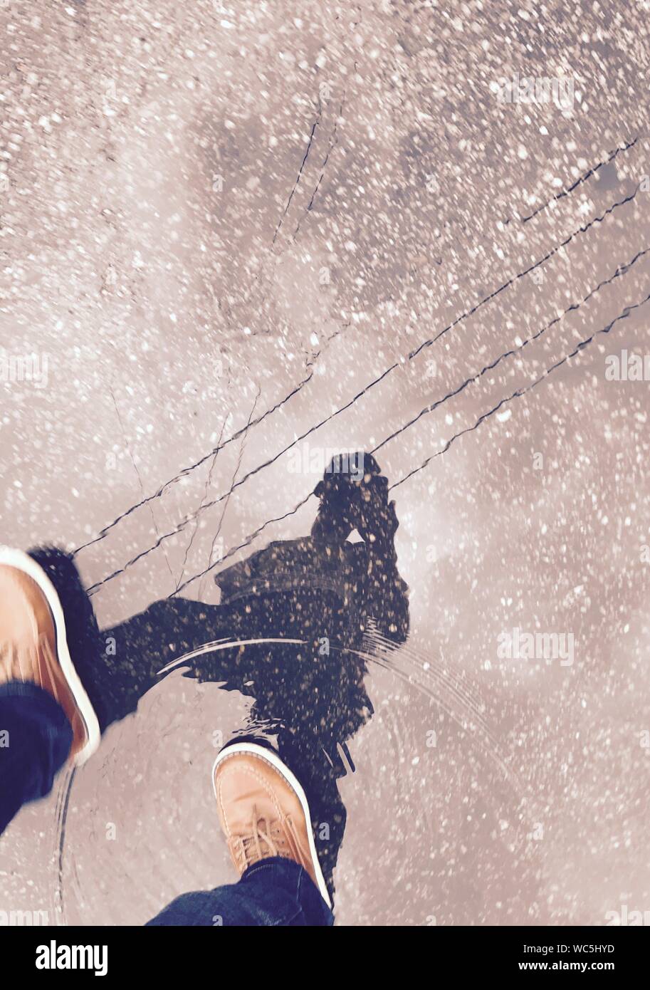 Stepping In Puddle High Resolution Stock Photography and Images - Alamy