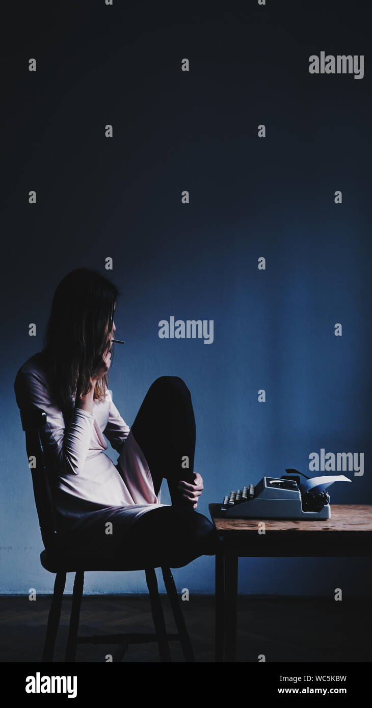 Smoking sitting hi-res stock photography and images - Alamy